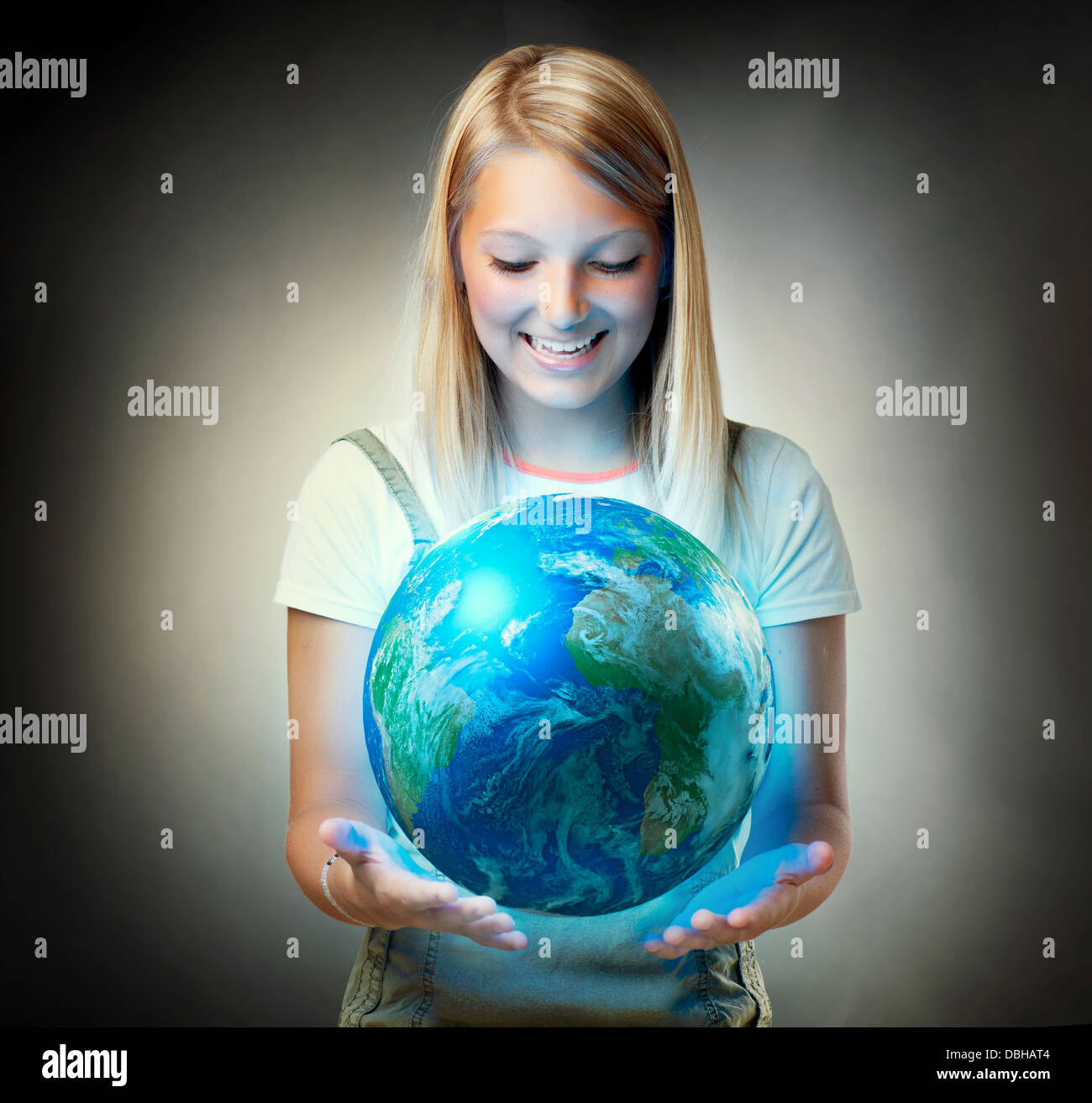 Girl holding the Planet Earth. Future Concept Stock Photo - Alamy