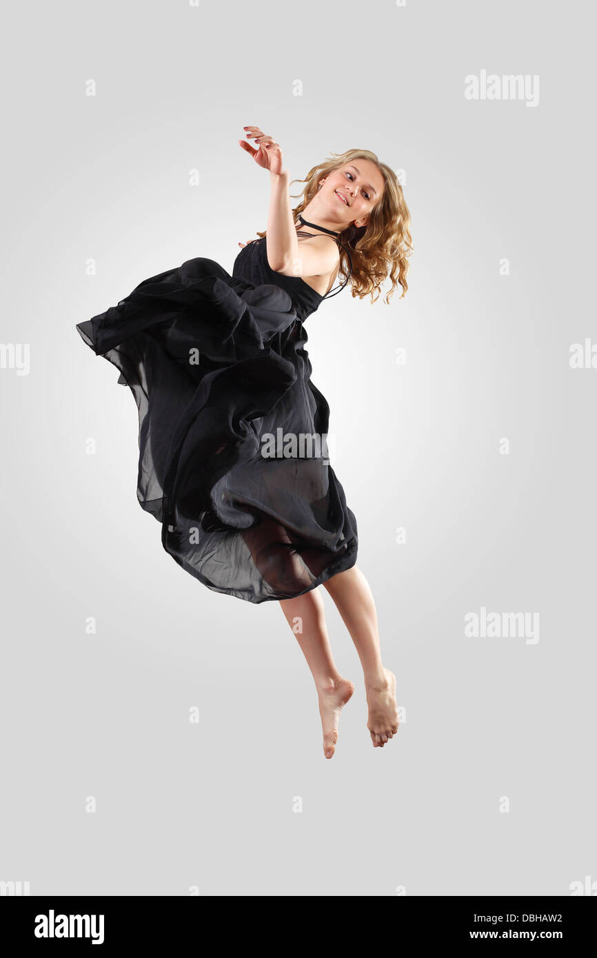 Young female dancer jumping Stock Photo - Alamy