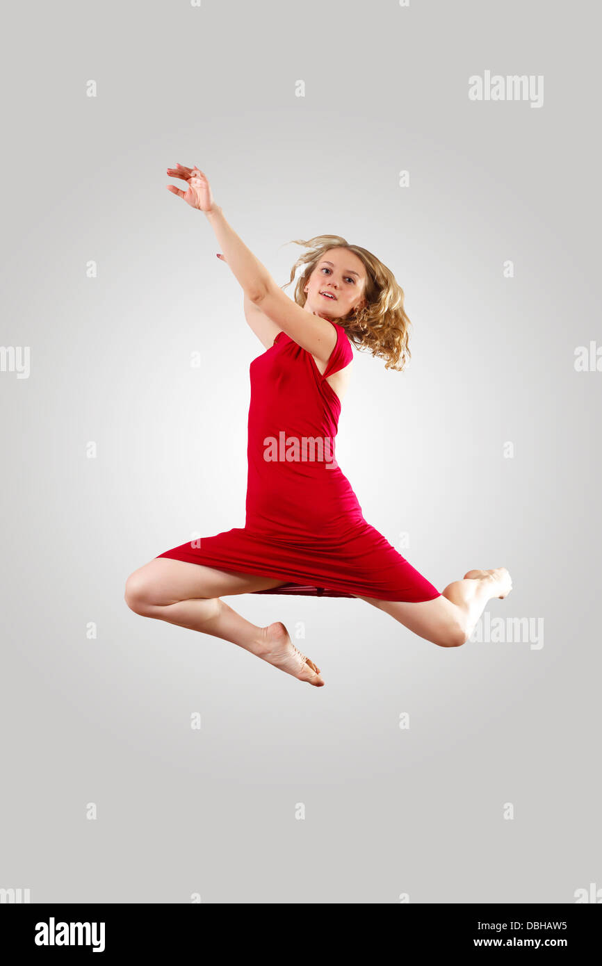Young female dancer jumping Stock Photo - Alamy