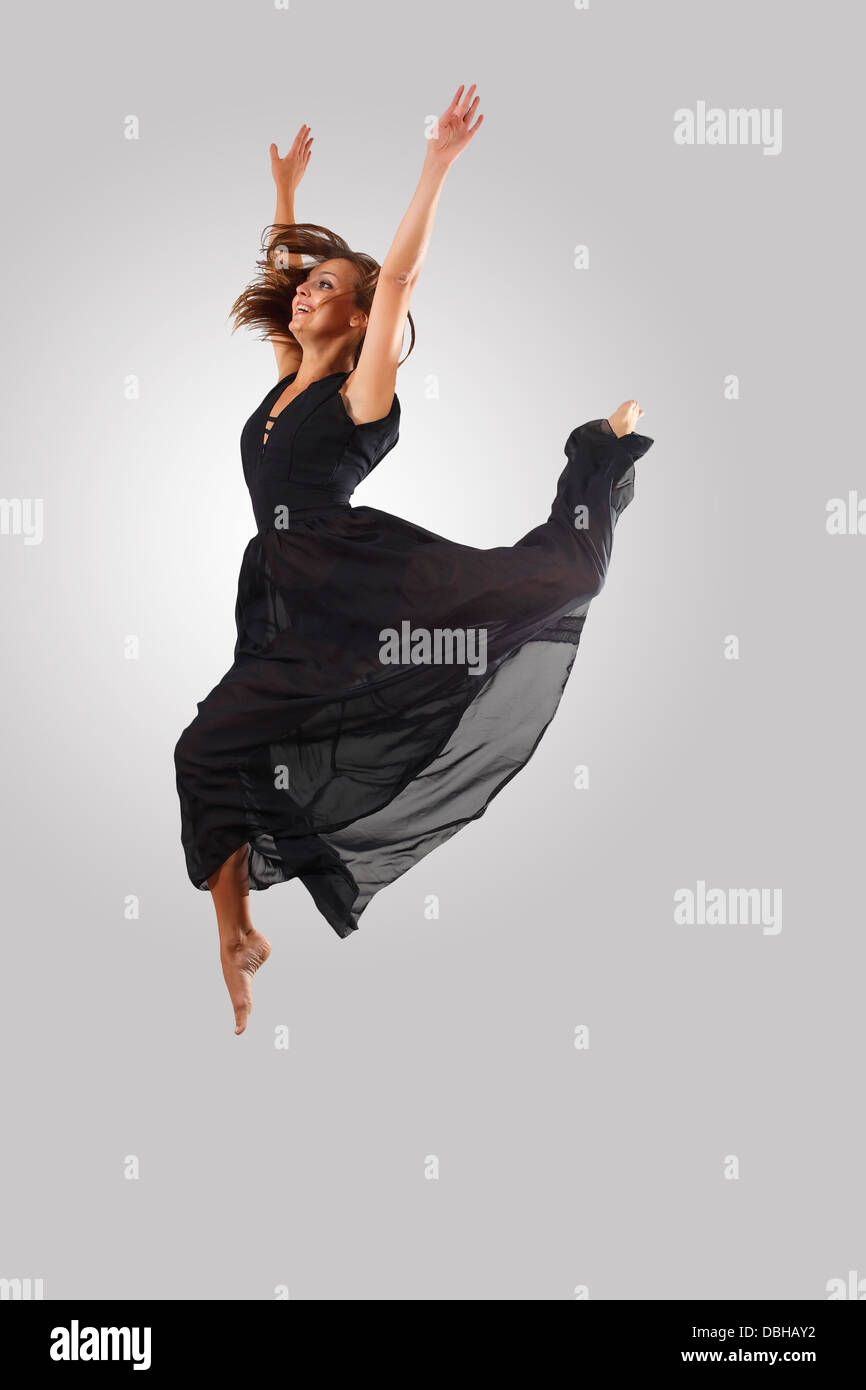 Young female dancer jumping Stock Photo - Alamy