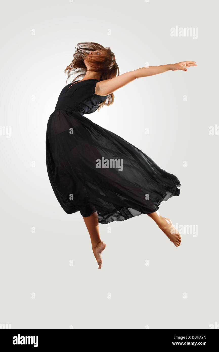 Young female dancer jumping Stock Photo - Alamy