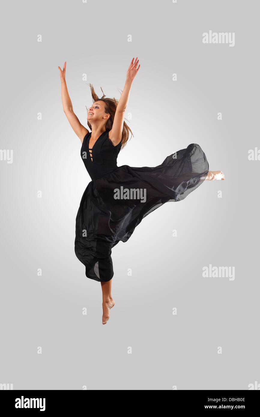 Young female dancer jumping Stock Photo - Alamy