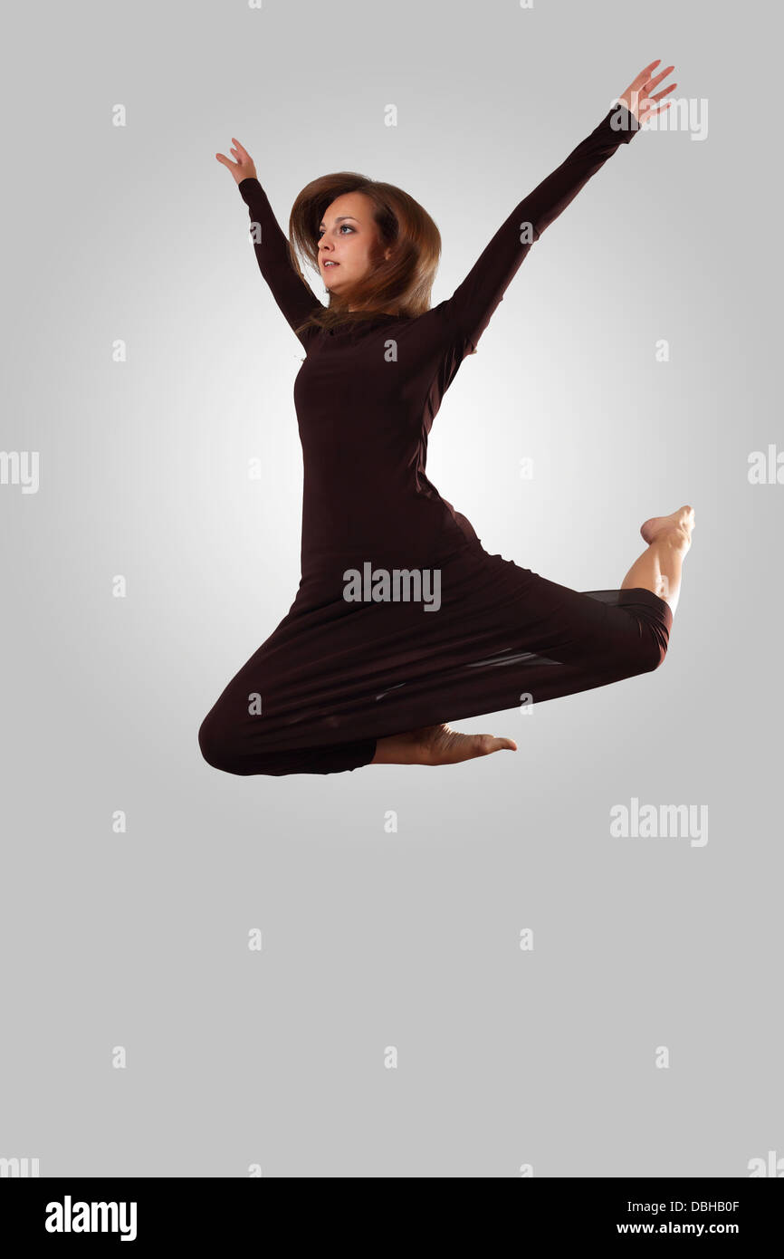 Young female dancer jumping Stock Photo - Alamy