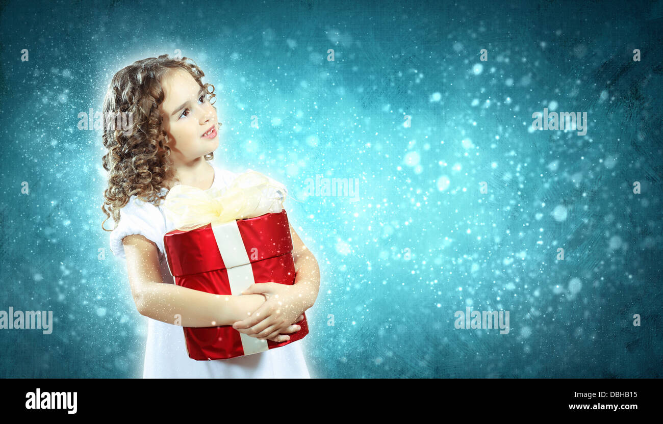Happy girl opening gift box Stock Photo - Alamy