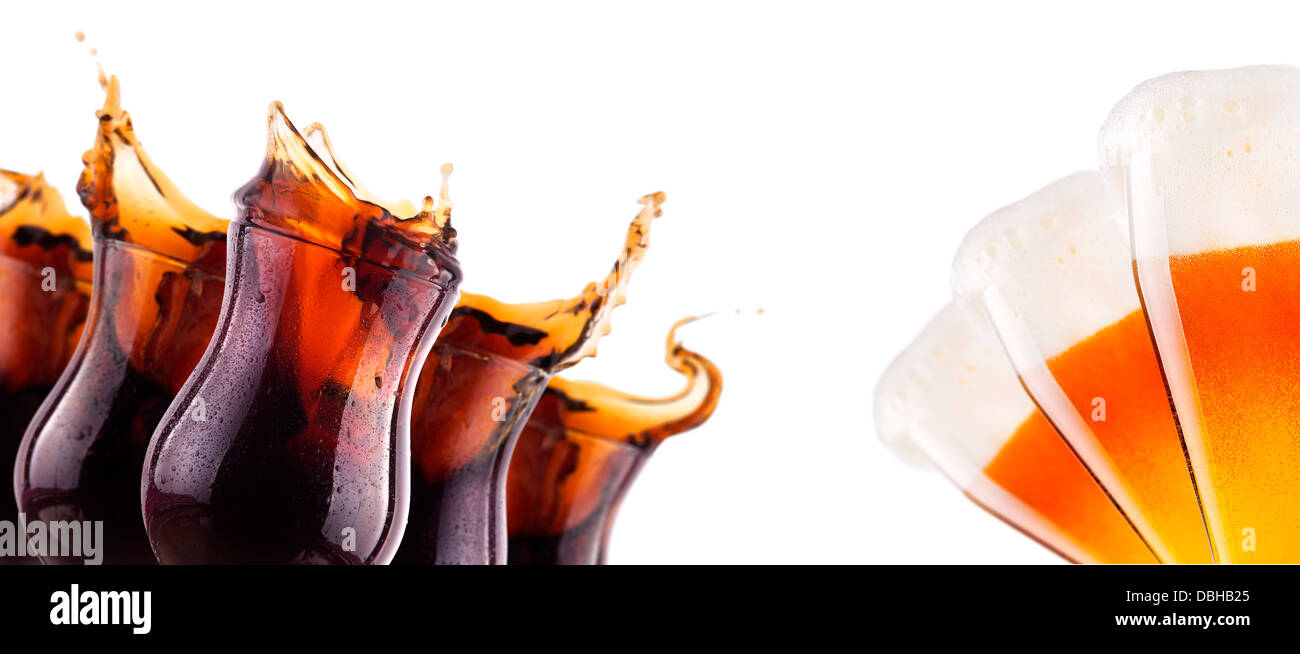 Fresh cola and beer background with splash isolated on a white Stock ...