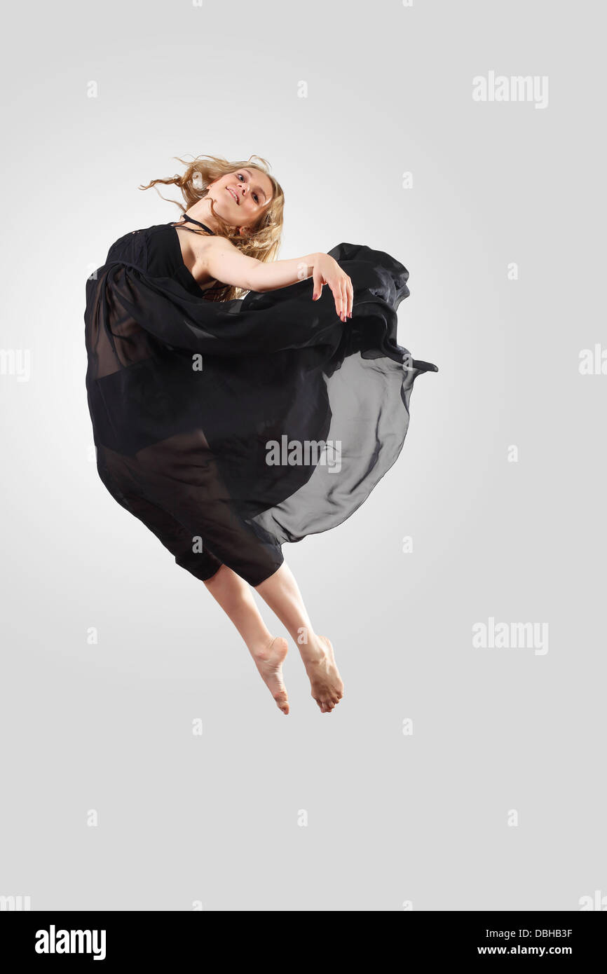 Young female dancer jumping Stock Photo - Alamy