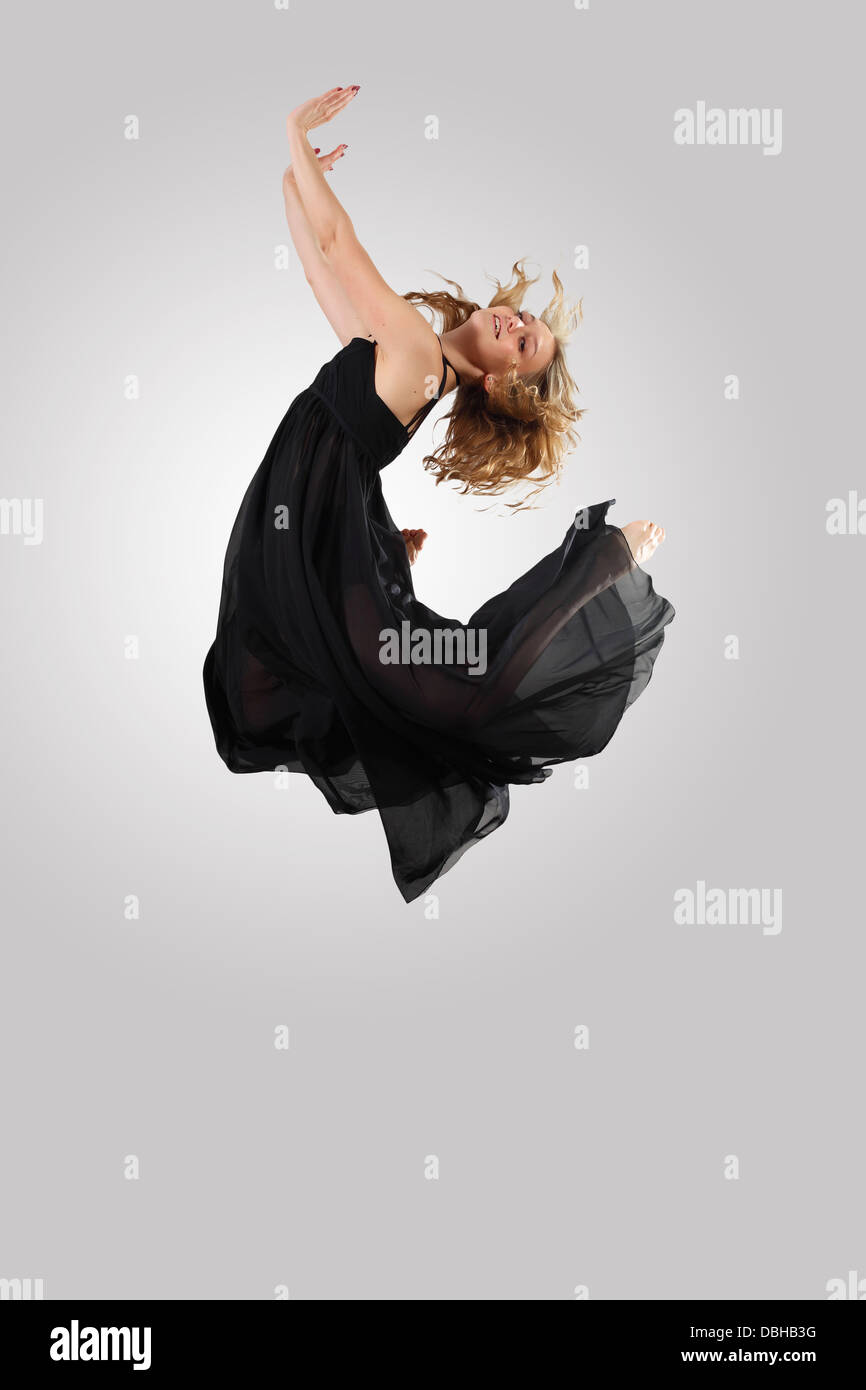 Young female dancer jumping Stock Photo - Alamy