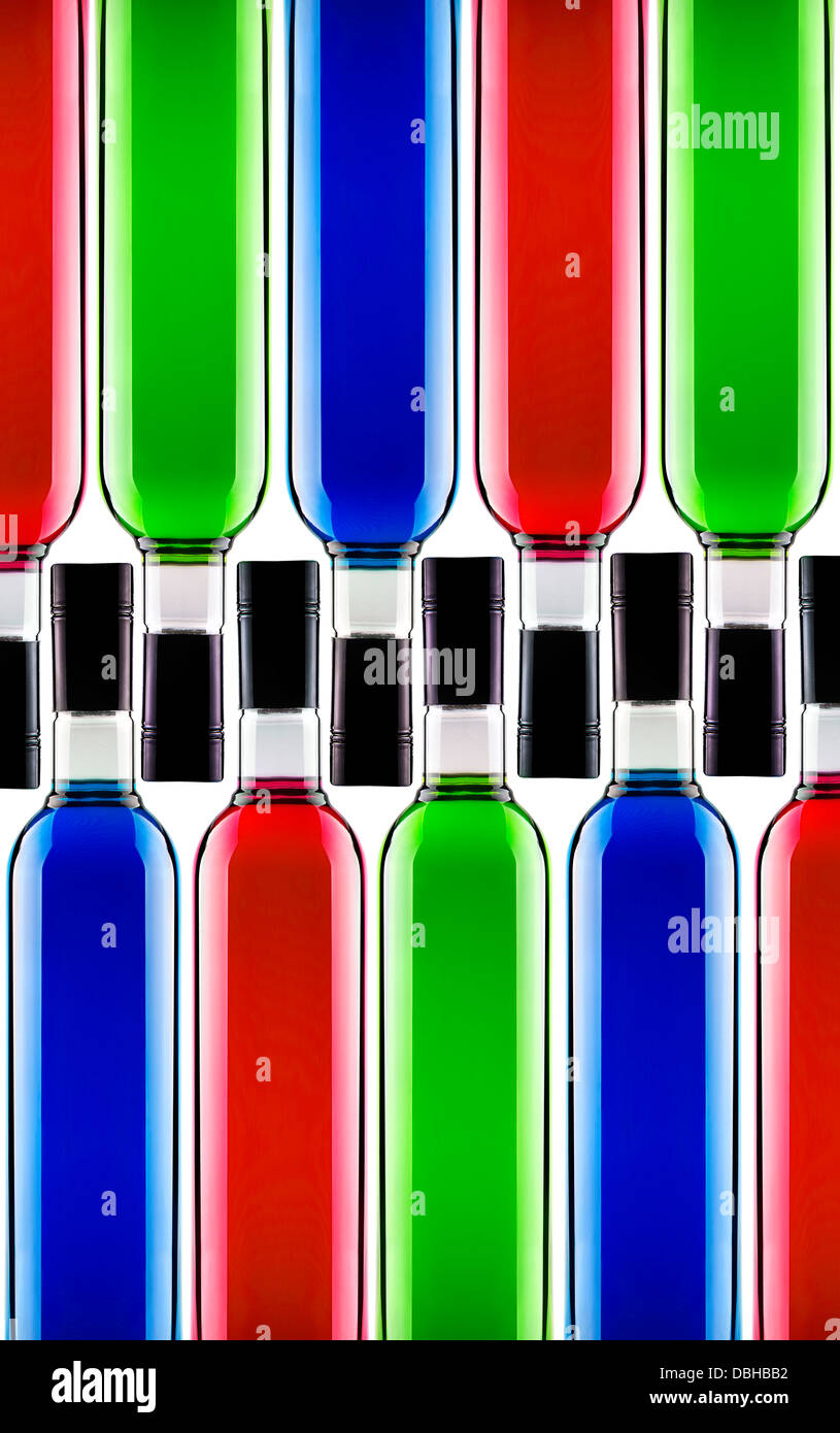 full bottles of different multicolored alcoholic cocktails isolated ...