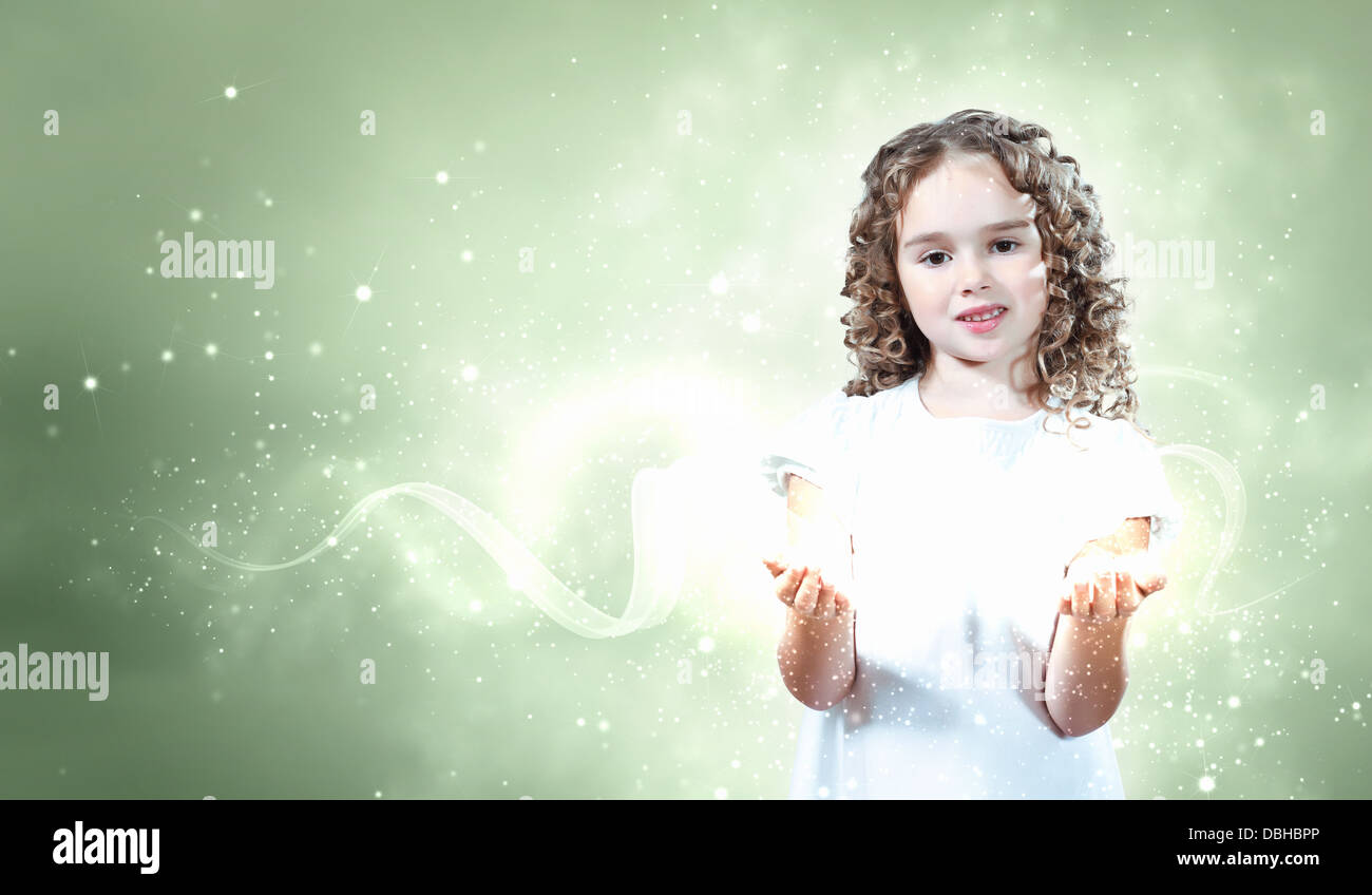 Child with magic light Stock Photo - Alamy