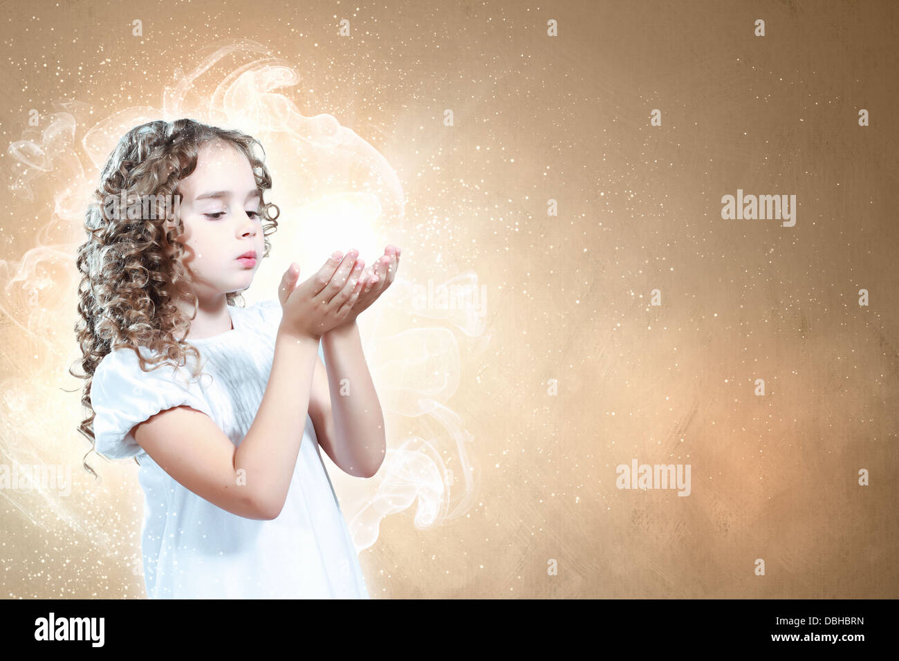 Child with magic light Stock Photo - Alamy