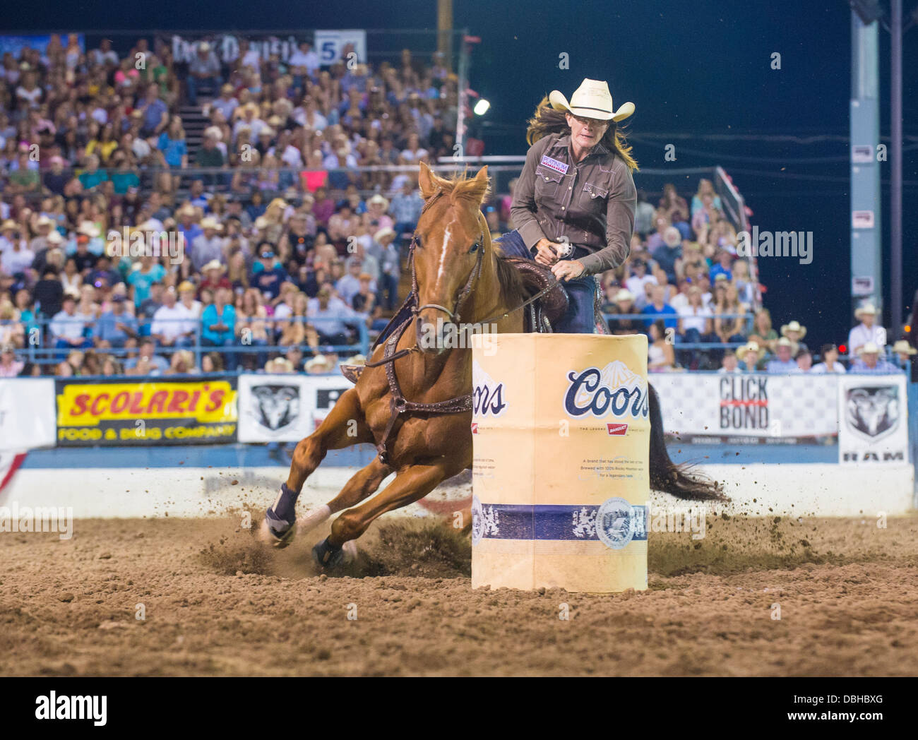 Cowgirl Participant in a Barrel racing competition at the Helldorado ...