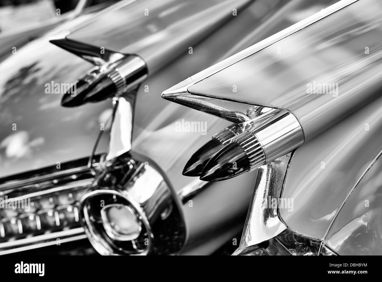 1950s Cadillac. Sharp tail fins with dual bullet tail lights ...