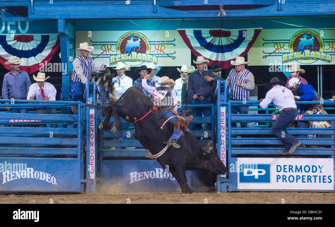 Cowboy Participant in a Bull riding Competition at the Reno Rodeo a ...