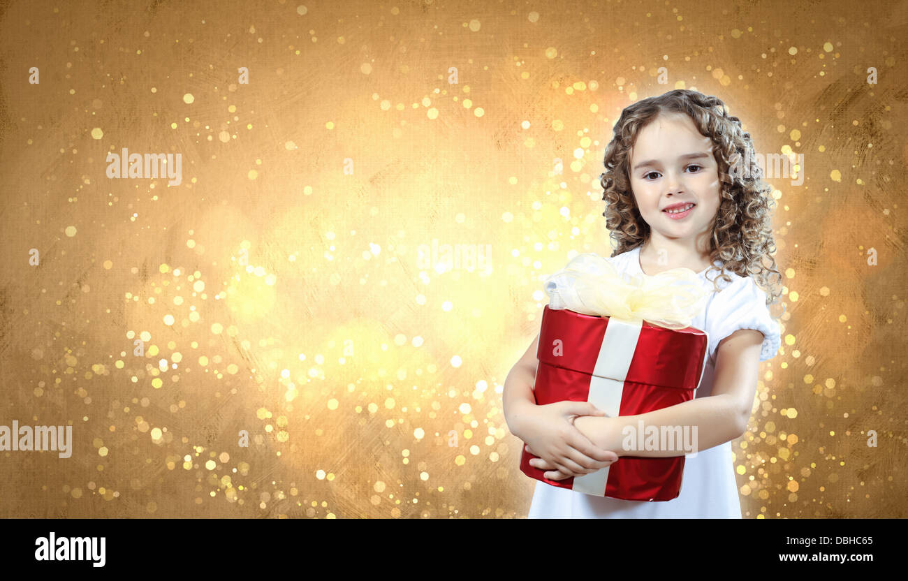 Happy girl opening gift box Stock Photo - Alamy