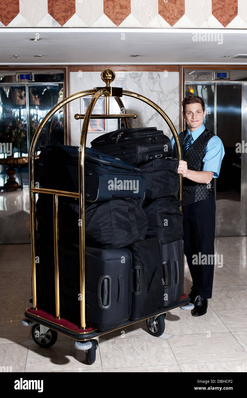 Bellhop and luggage cart hi-res stock photography and images - Alamy