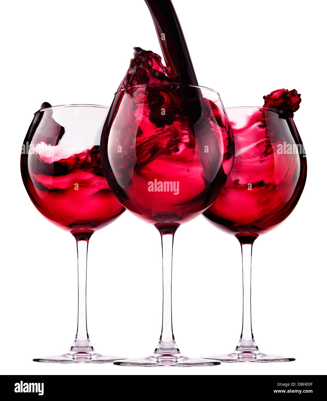Glass with red wine splash Stock Photo - Alamy