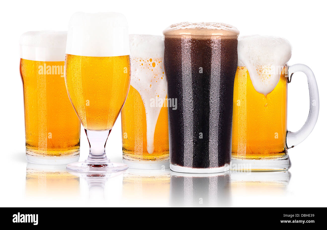 Frosty glass of dark and light beer set isolated on a white background ...