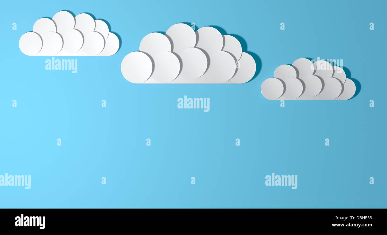 A set of three handmade paper clouds casting soft shadows isolated on a ...