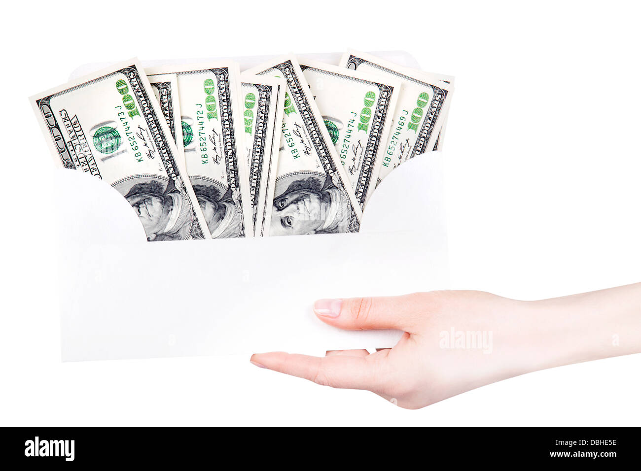 Hand and money in envelope isolated on white background Stock Photo - Alamy