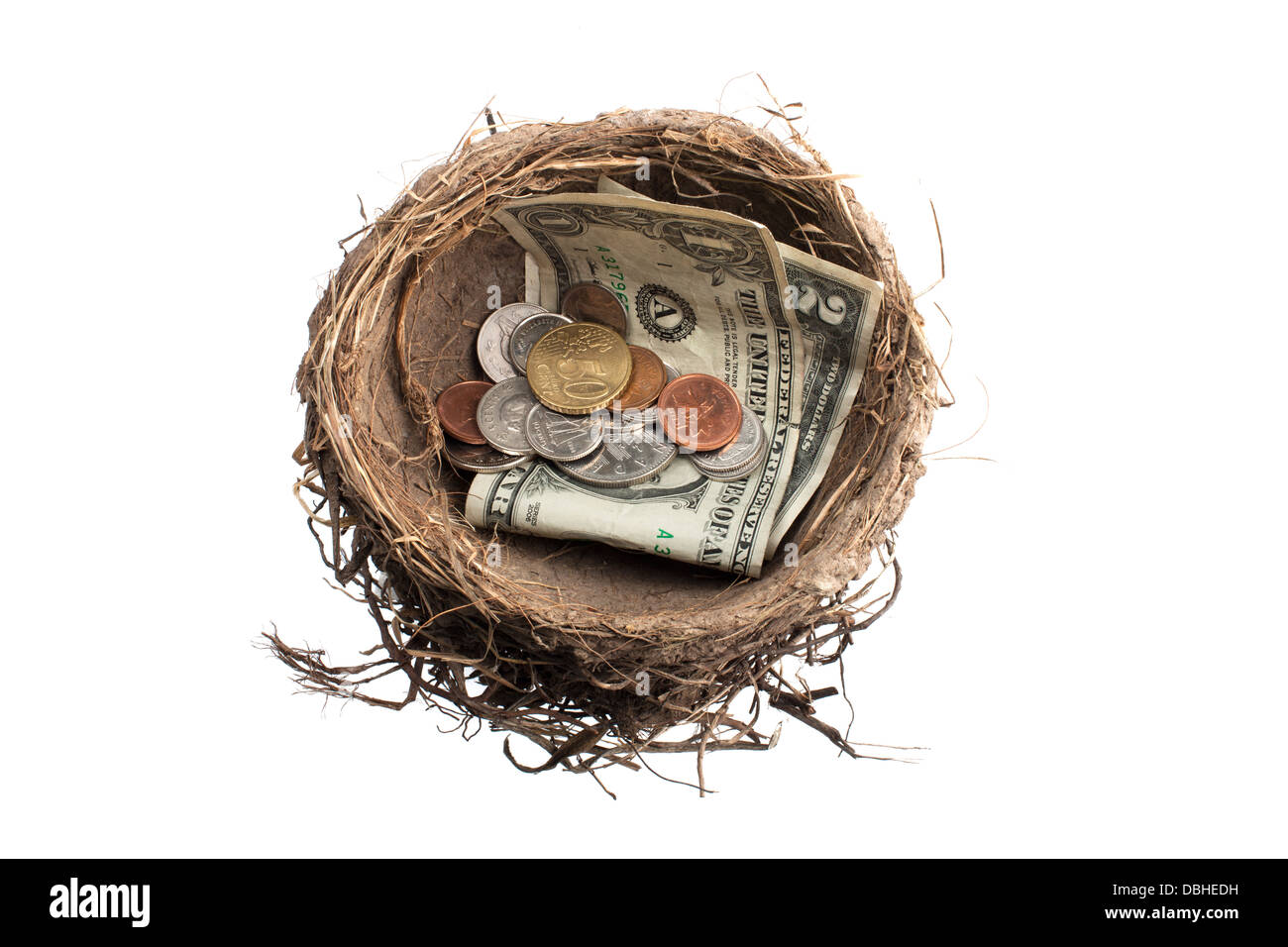 Nest egg coins Cut Out Stock Images & Pictures - Alamy