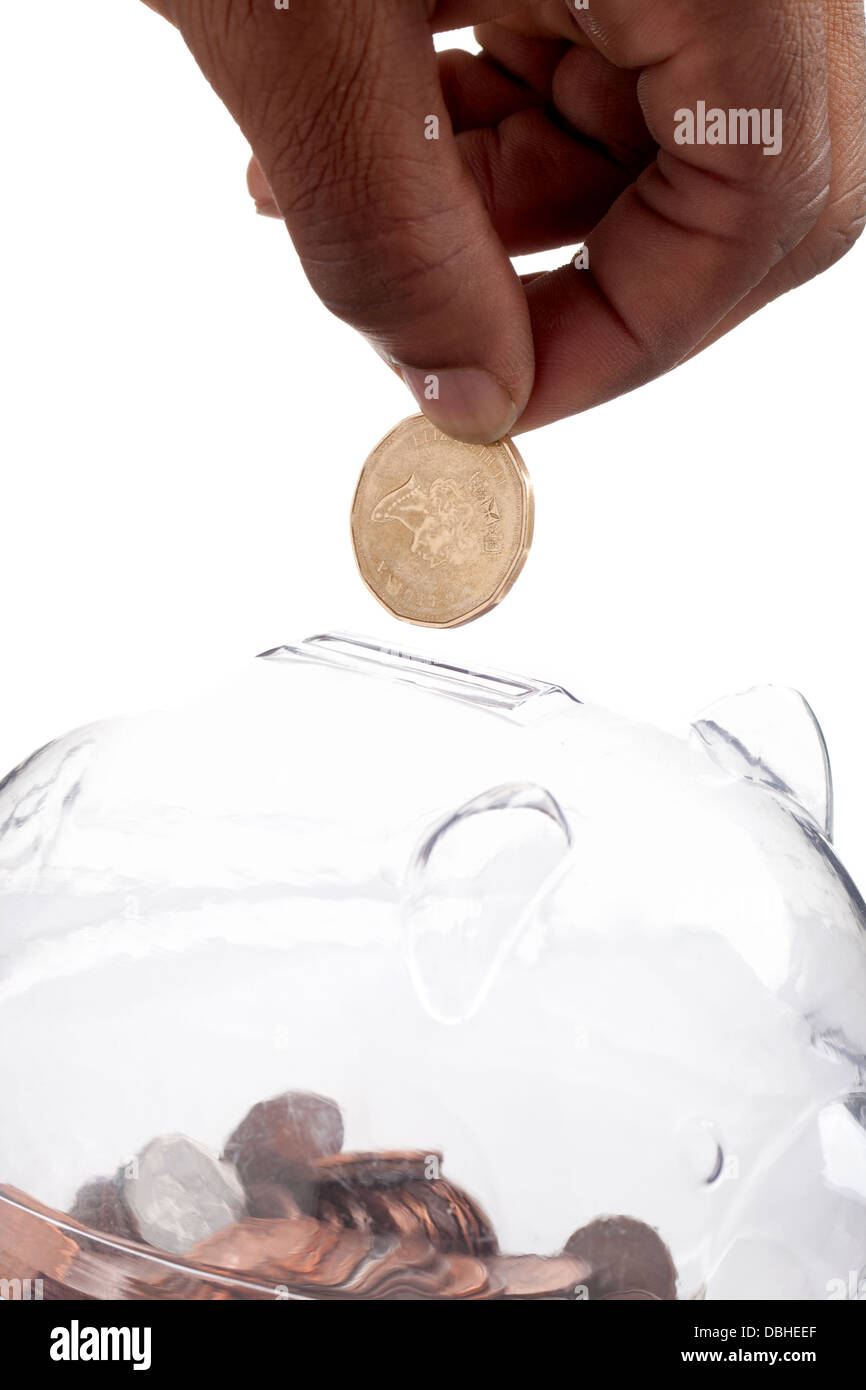 hand dropping a coin Stock Photo - Alamy