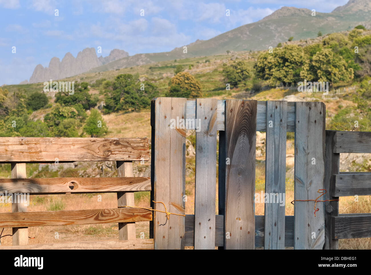wicket door plank barrier in front Corsican mountain landscape Stock ...