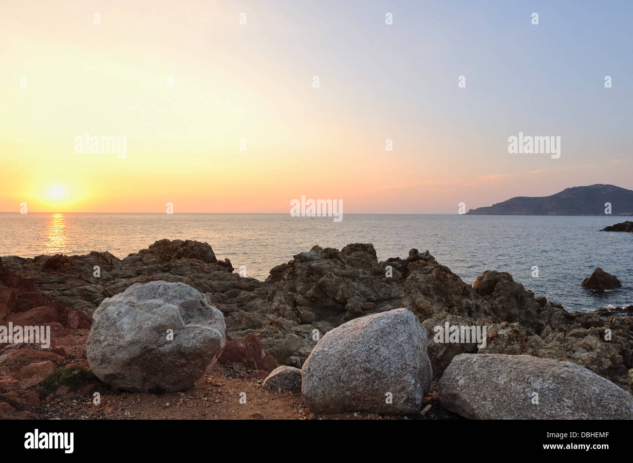 beautiful sunset on the orange cliffs of a gulf in Corsica Stock Photo ...