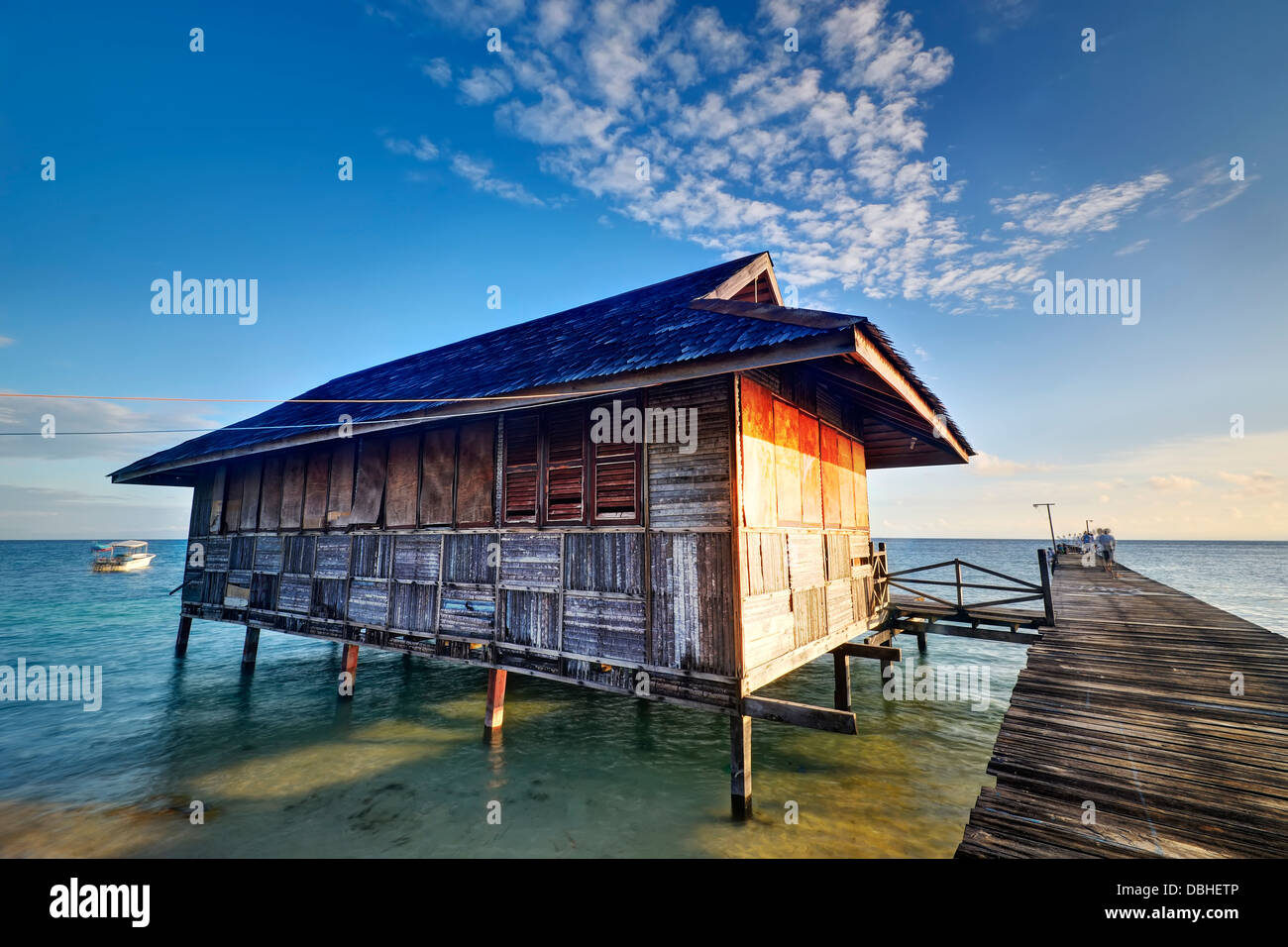 Shed and bridge on the beach Stock Photo - Alamy