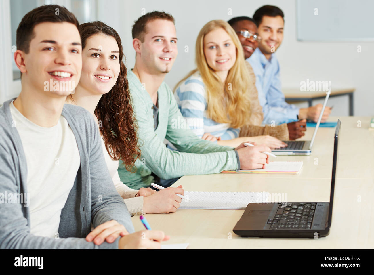 Happy students learning in seminar of an university Stock Photo - Alamy