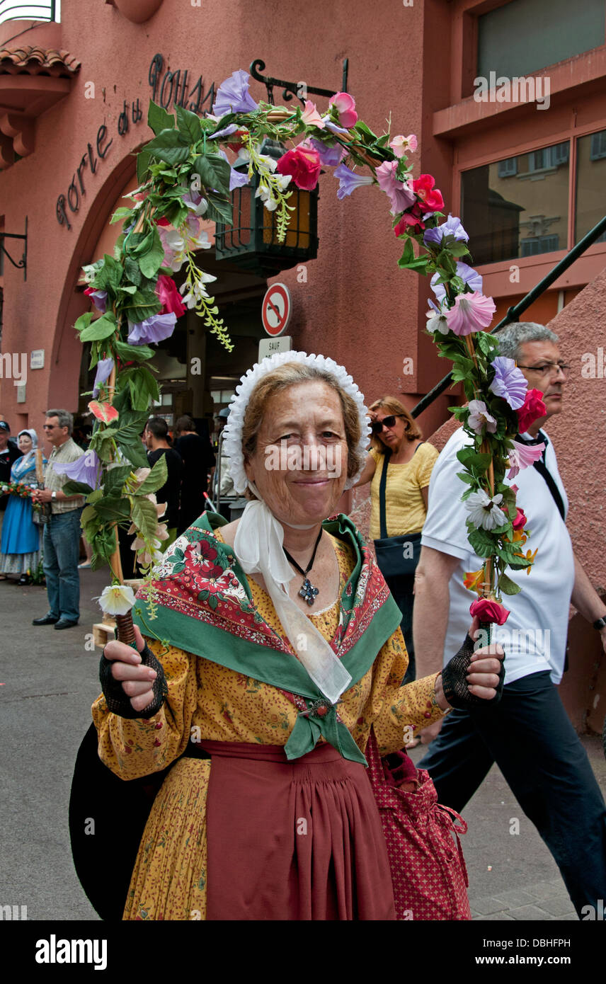Cannes Vieux old port Flower parade old woman France French Riviera ...