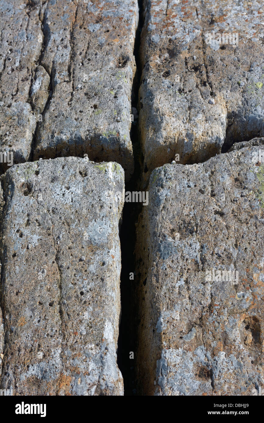 Cross shaped fissure in rock Stock Photo - Alamy