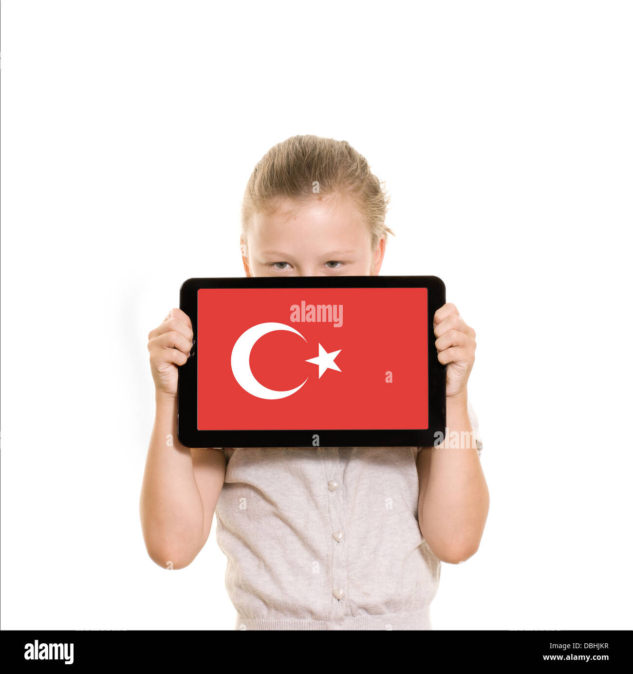 flag of Turkey displayed on tablet computer held by young girl Stock ...
