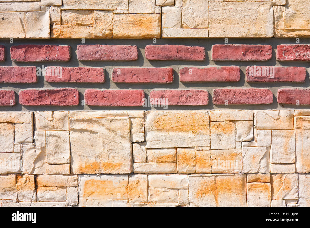 red and yellow brick wall - background Stock Photo - Alamy