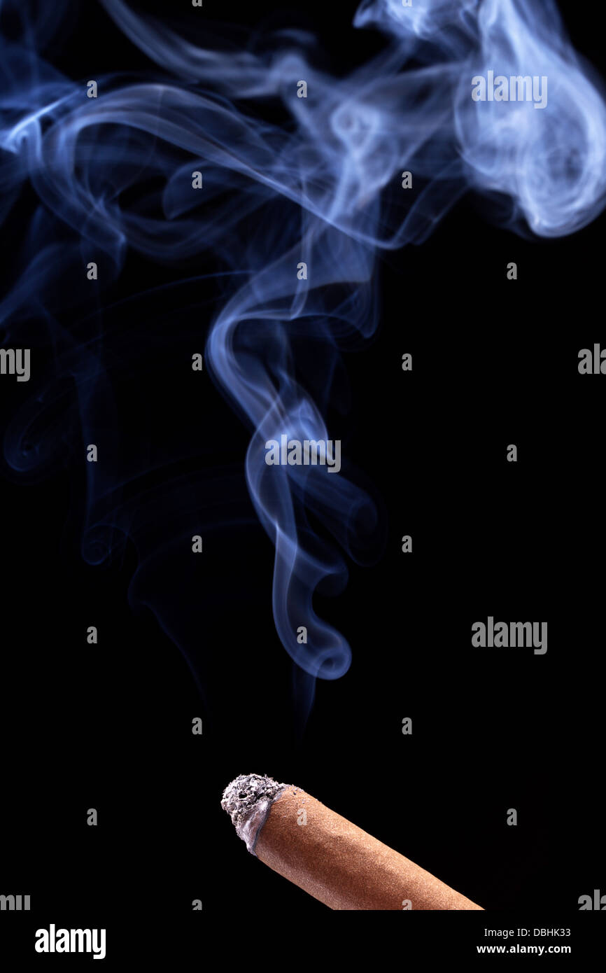 Abstract cigar smoke on a black background Stock Photo - Alamy