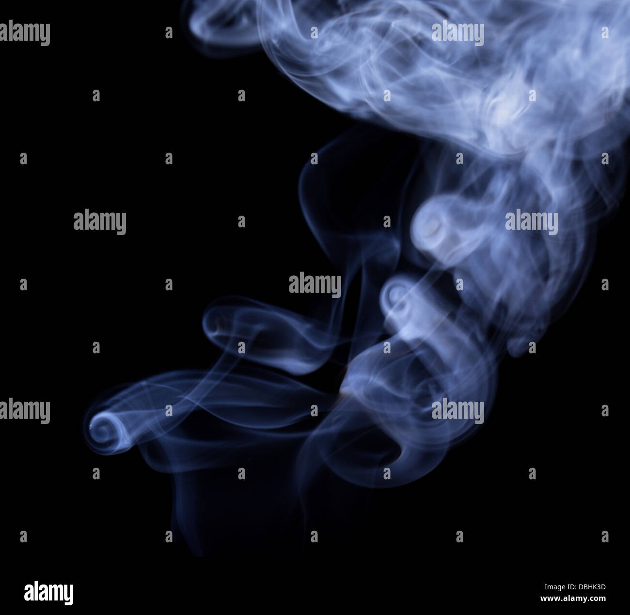 Abstract cigar smoke on a black background Stock Photo - Alamy