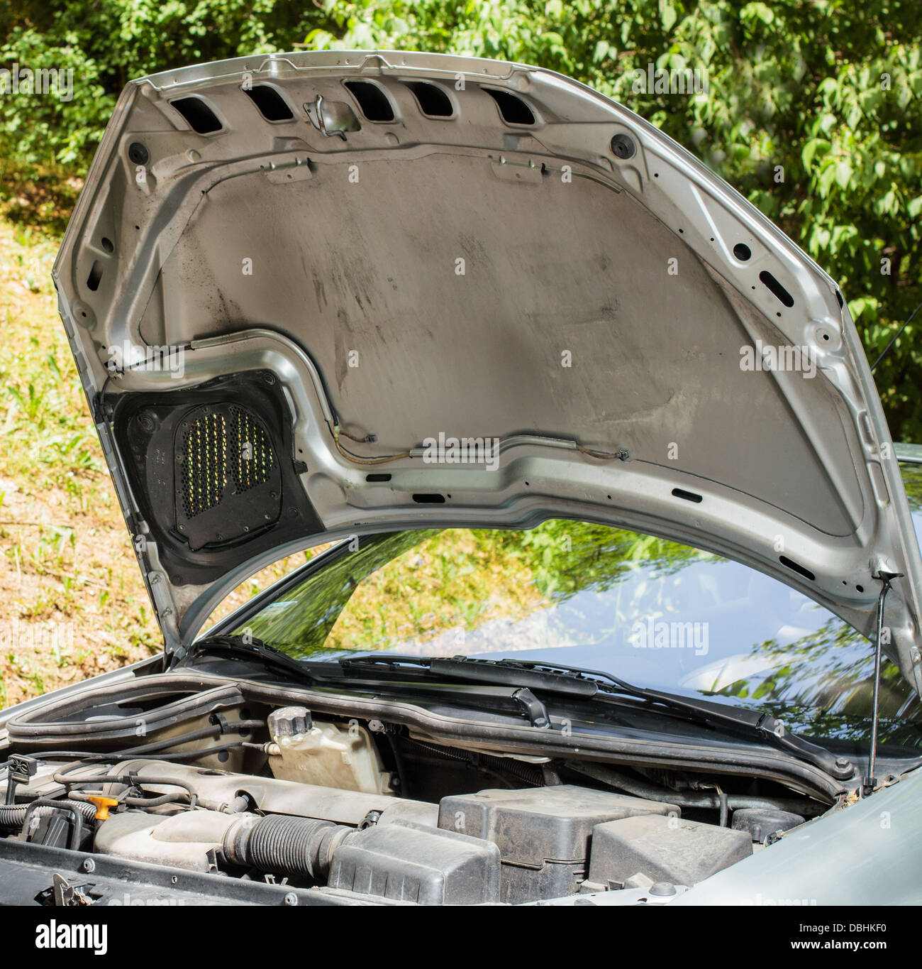 Open car hood Stock Photo - Alamy