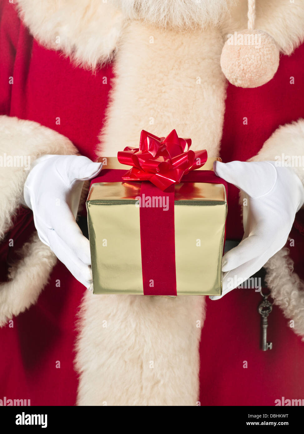 santa holding gift Stock Photo - Alamy