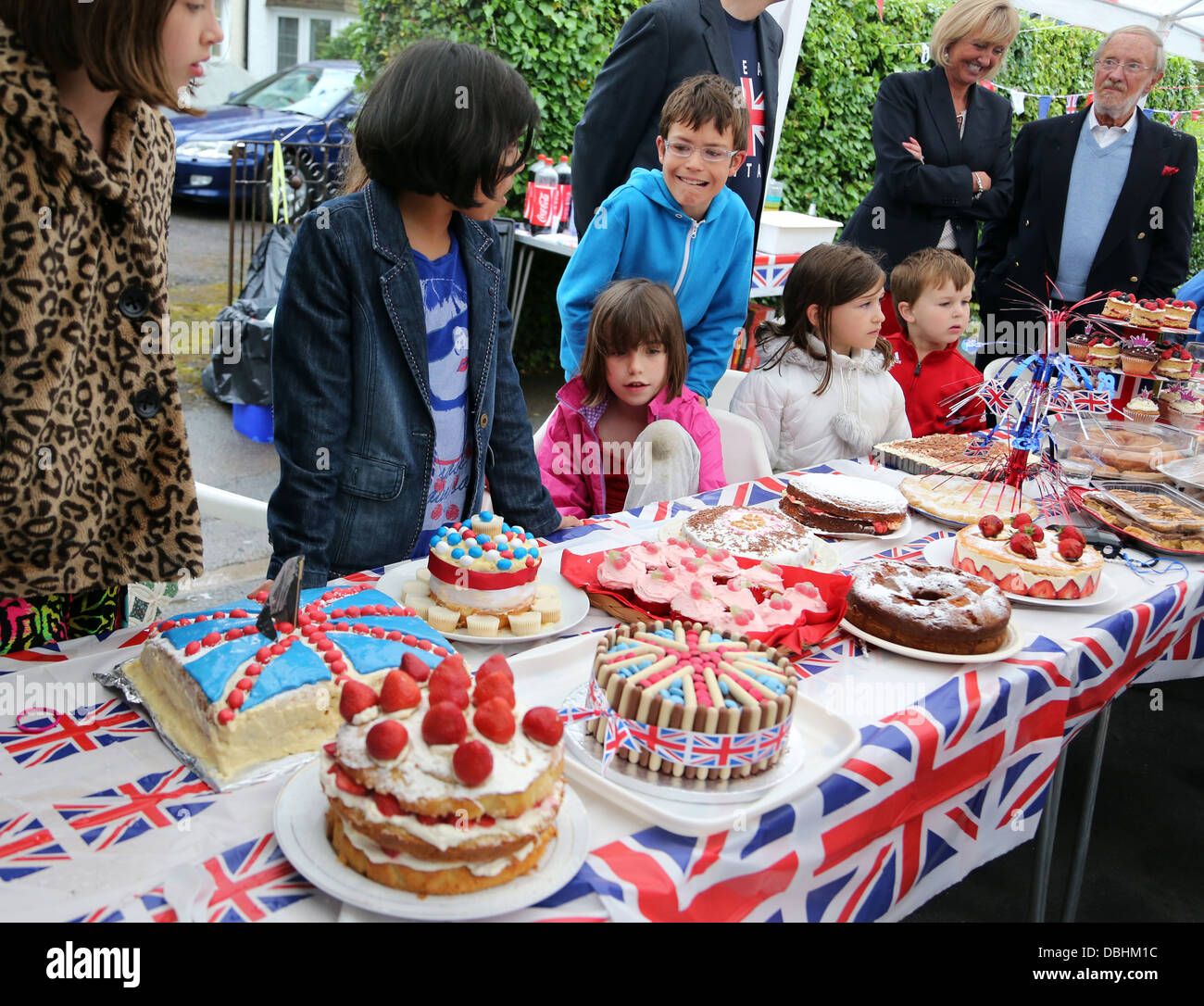 People Looking At Cakes During Cake Competition At Street Party During ...
