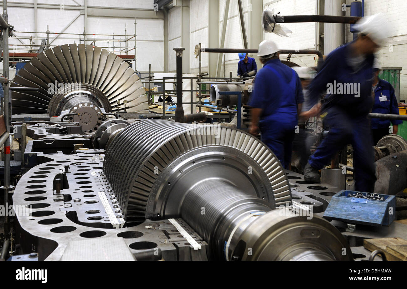 Technicians assemble a new steam turbine system in the hard coal-fired ...