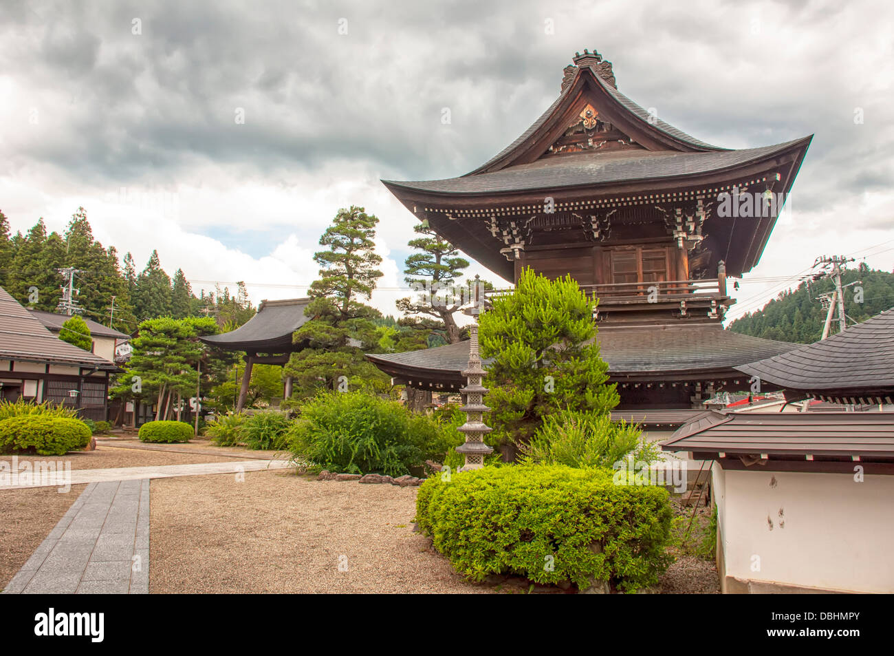 View of a Japanese temple surrounded by lots of vegetation Stock Photo ...
