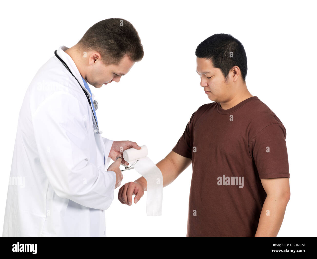the doctor cut the bandage Stock Photo - Alamy