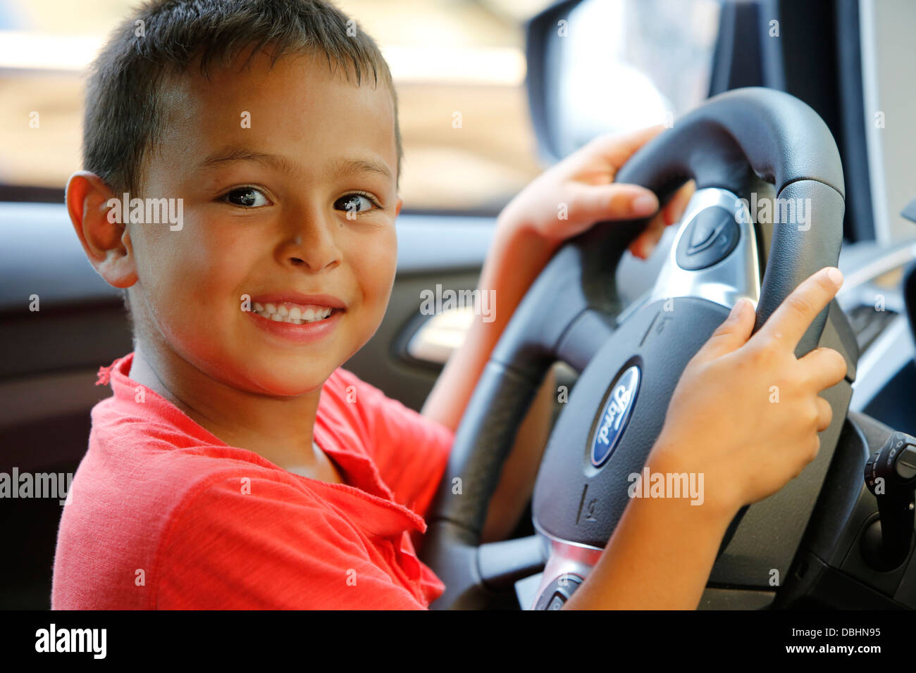 Boy pretending to drive hi-res stock photography and images - Alamy