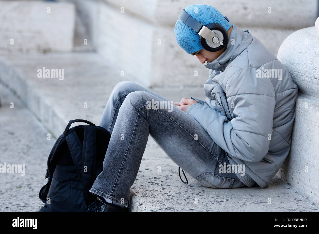 Boy listening music Stock Photo - Alamy