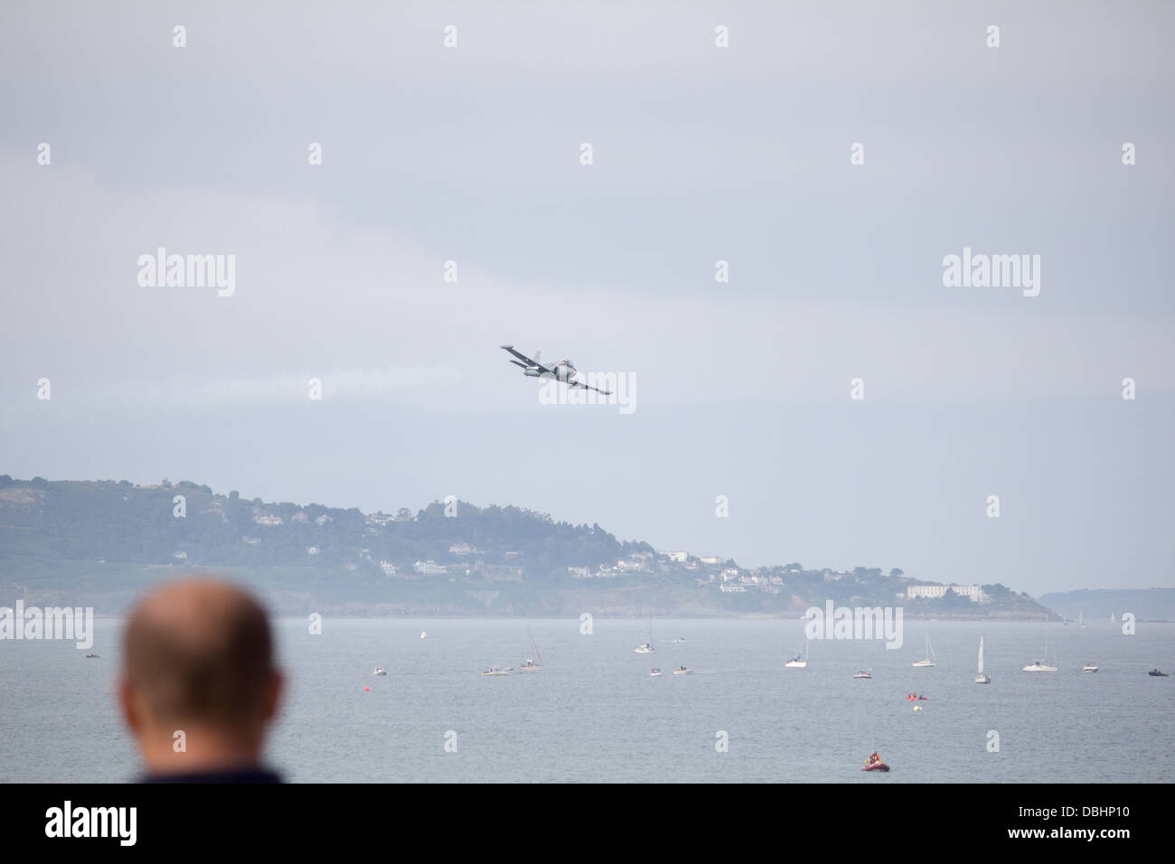 Military jet flying over a beach in Bray, Co. Wicklow, Ireland during ...