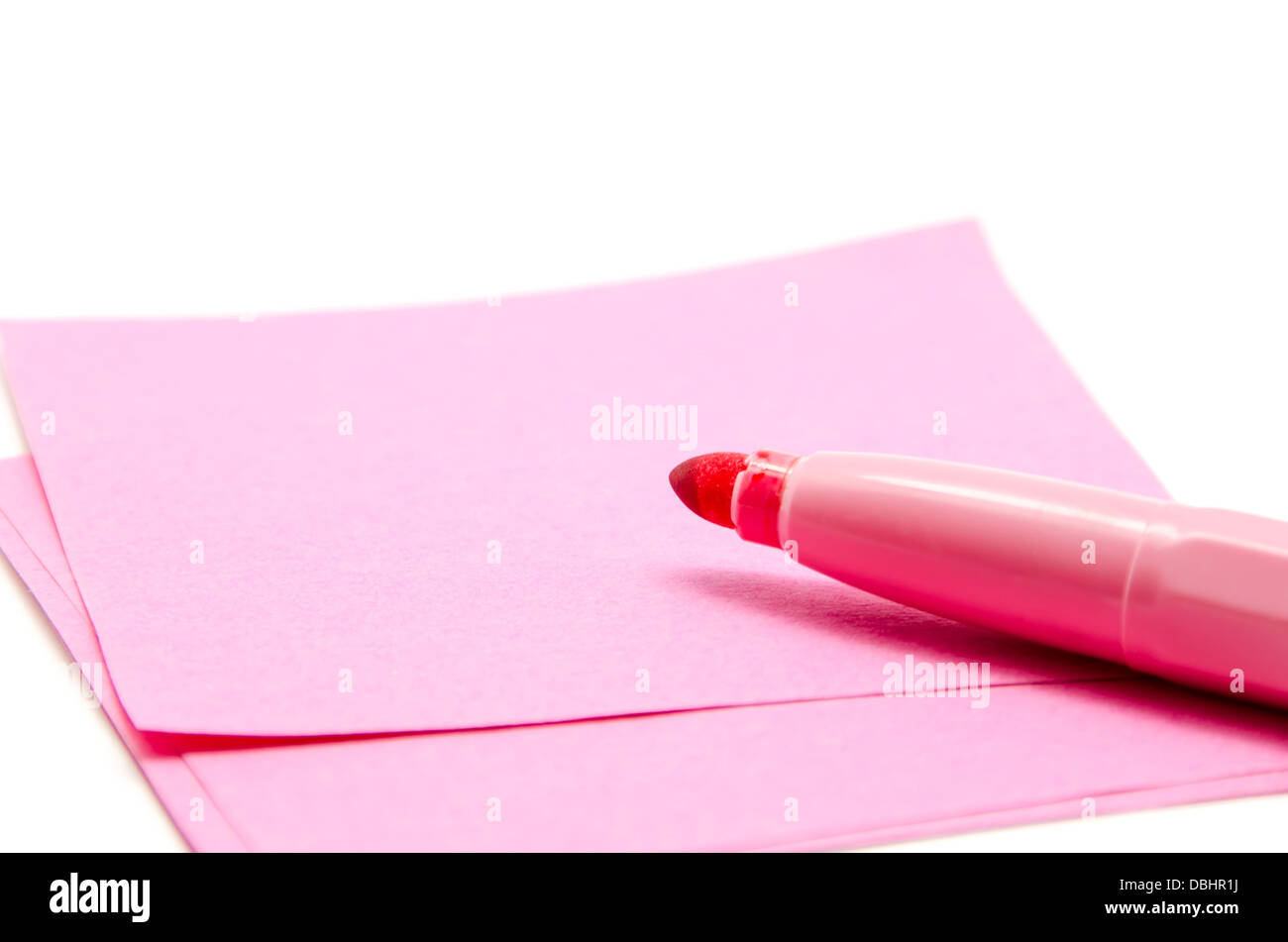 Pens on colored paper Stock Photo - Alamy