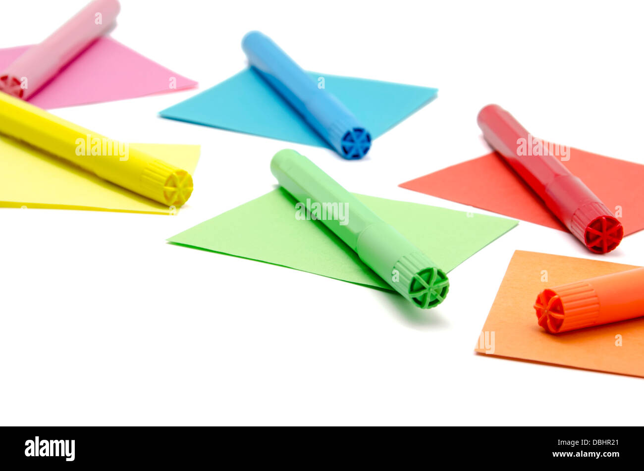 Pens on colored paper Stock Photo - Alamy