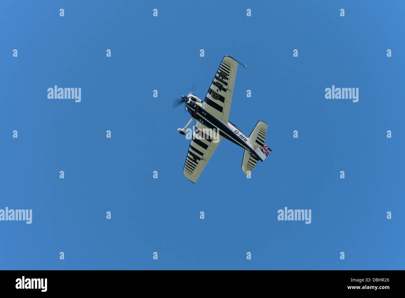 XtremeAir Sbach 300 G-IIRI in flight over Wickenby Airfield Stock Photo ...