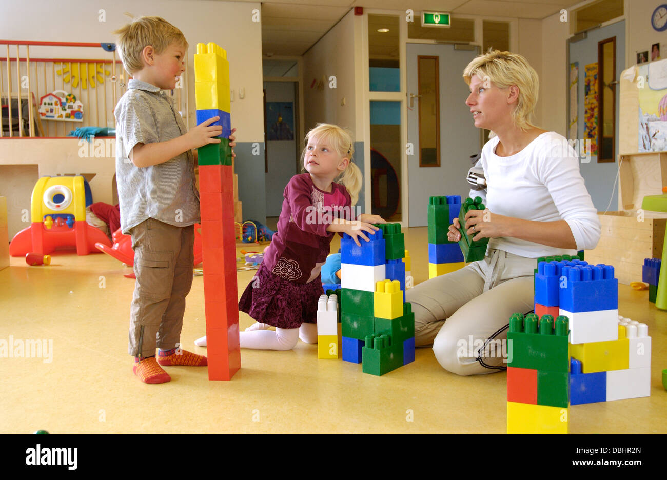 Children playing at the Day care center Stock Photo - Alamy