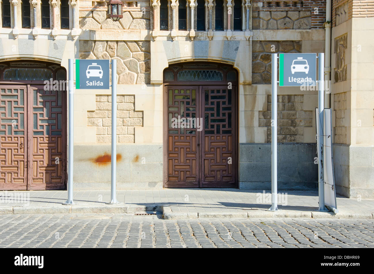 Signs of arrival and departure taxi Stock Photo - Alamy