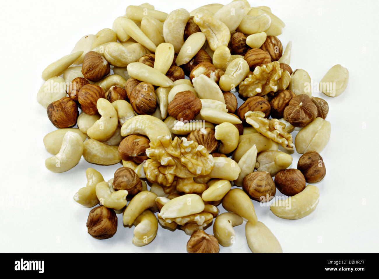 Assortment of nuts on white background Stock Photo - Alamy